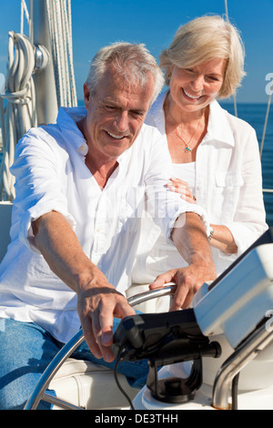 Senior couple using gps on their mobile phone during a road trip Stock ...
