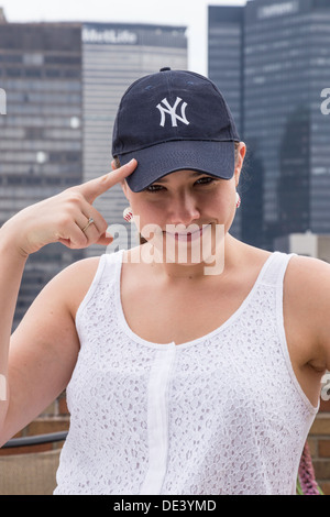 MLB Yankees Baseball Female Fan in Midtown Manhattan, NYC Stock Photo ...