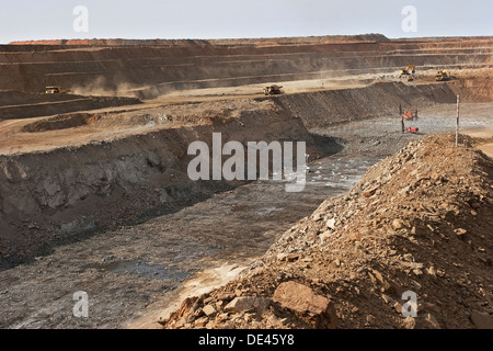 Surface gold mining, drilling holes for charges before blast with drill ...