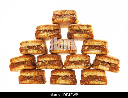 Pyramid of biscuits on a white background Stock Photo - Alamy