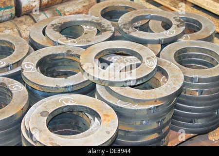 New flanges in the workshop of the plant Stock Photo - Alamy