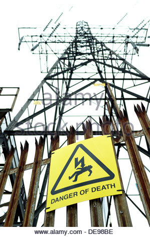 Danger sign warning of hazardous high voltage power lines and Stock ...