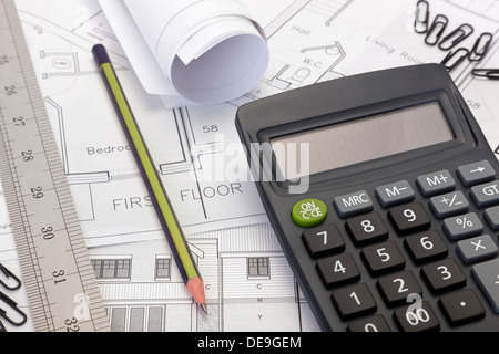 House plans with calculator for costing estimate Stock Photo - Alamy