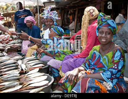 The Gambia Serekunda market woman selling tomatoes Stock Photo - Alamy