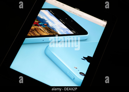 iPhone 5c web-page displayed in an Apple iPad Stock Photo - Alamy