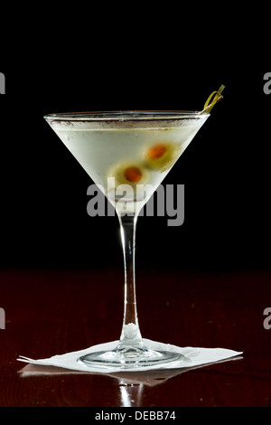 classic cocktail served with pimento stuffed cocktail olives Stock ...
