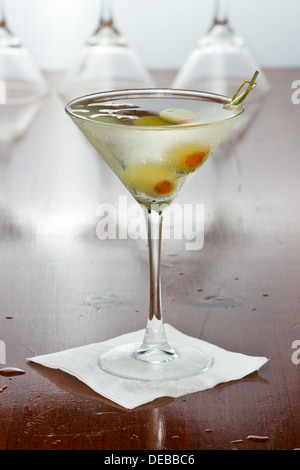 classic cocktail served with pimento stuffed cocktail olives Stock ...