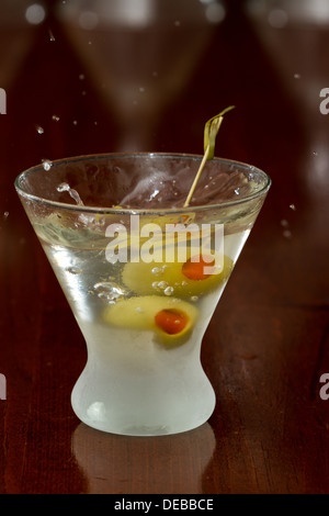 classic cocktail served with pimento stuffed cocktail olives Stock ...