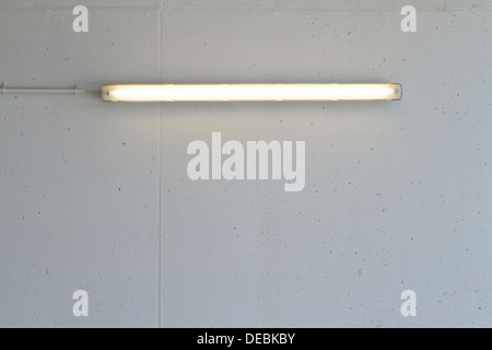 Fluorescent light on concrete wall Stock Photo - Alamy