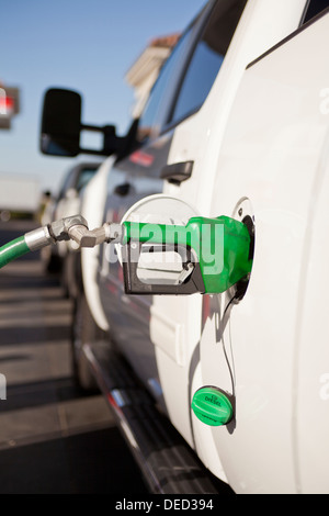 Chevy truck filling up with diesel fuel at gas station - USA Stock ...