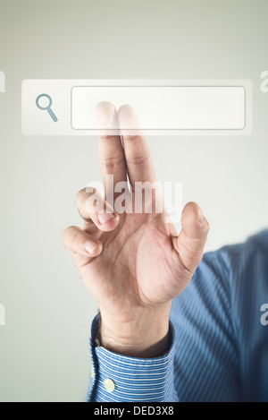 Businessman clicking on touch screen Stock Photo - Alamy