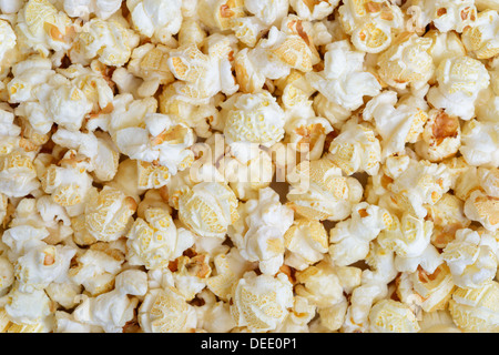 Popcorn close-up, whole background Stock Photo - Alamy