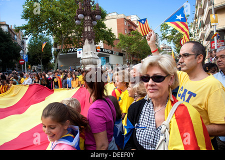 Catalans waving Catalan Independence flags on National Catalonia day ...