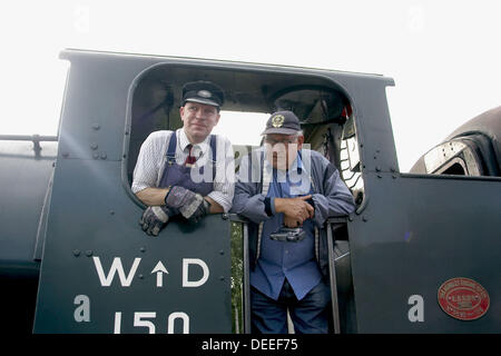 Train driver leaning out the drivers window of a Class 35 Hymek Stock ...