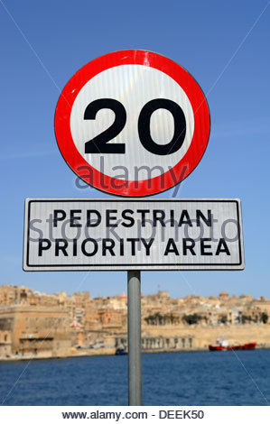 20 kph speed limit and speed bumps signs Stock Photo: 50810535 - Alamy