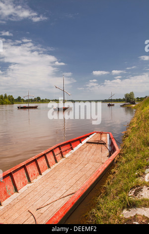 Traditional boats moored at the Loire river at Saint-Laurent-le-Veil ...