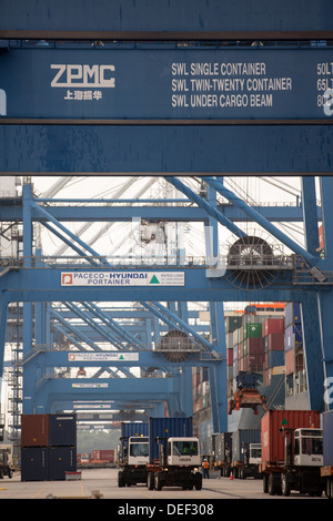 Workers unload three container ships at Charleston Ports Wando Welch ...