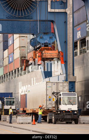 Workers unload three container ships at Charleston Ports Wando Welch ...