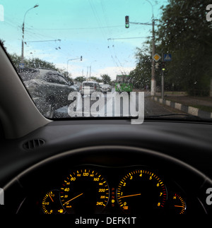 dashboard and rain droplets on car windshield Stock Photo - Alamy