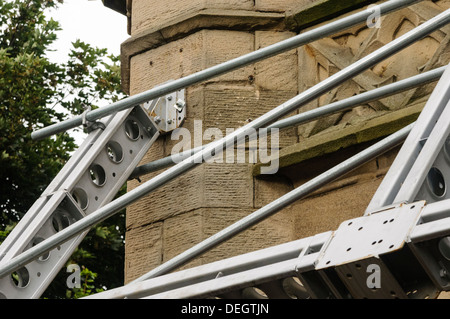 Steel support holding up a leaning wall to prevent it falling Stock ...