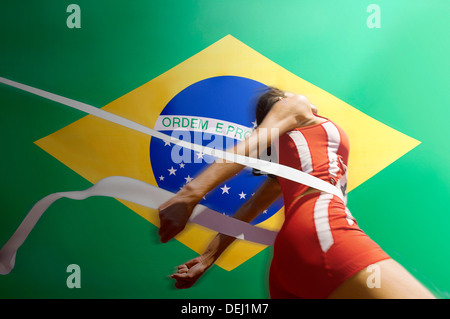 Runner Breaking Finish Line Tape Stock Photo - Alamy