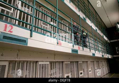 Prison guards inside prison unit near Houston, Texas walk through cells ...