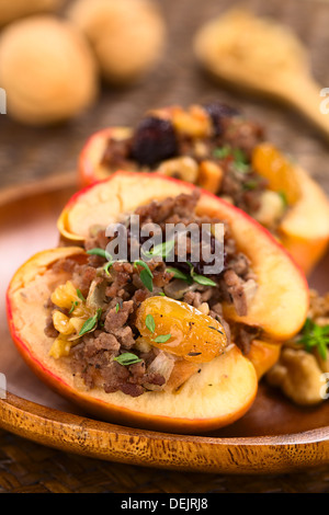 Fresh baked stuffed apple with walnut, almond, raisin, sultana, butter ...