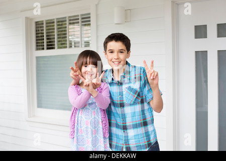 Boy And Peace Sign Stock Photo - Alamy