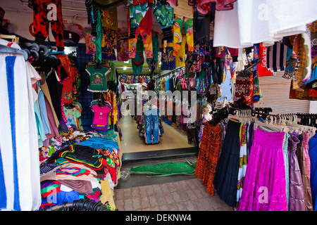 Clothes hanging at market stall, Calangute Bazaar, Calangute, North Goa ...