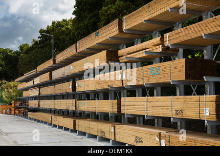 timber stacked on racking in builders merchants Stock Photo - Alamy