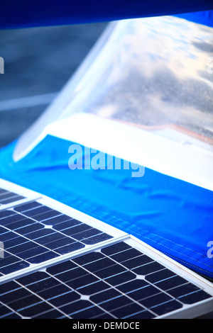 Solar charging batteries aboard a sail boat. Photovoltaic panels ...