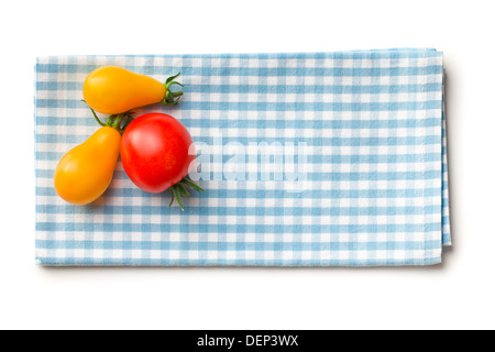 Top view of fresh tomatoes isolated on blue background Stock Photo - Alamy