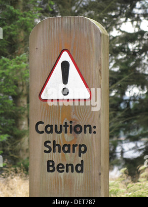 Warning Sign for a Dangerous Sharp Bend on a Mountain Biking Trail, UK ...