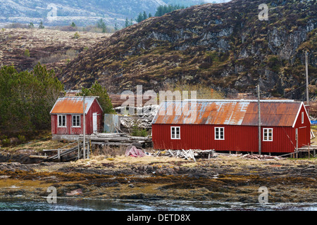 Traditional Norwegian red wooden barns on the sea coast Stock Photo - Alamy