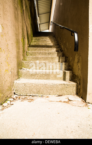 Old concrete stairs between two walls Stock Photo - Alamy