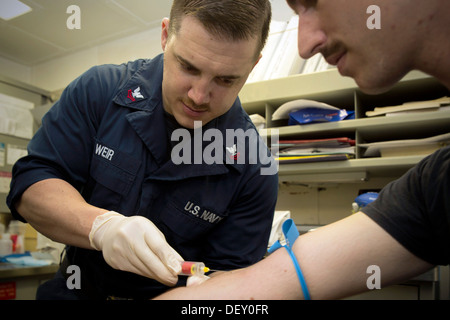 A Marine with the 26th Marine Expeditionary Unit practices using a ...