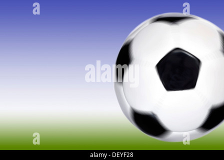Football soccer ball moves in a curved direction. Kicking, bending or ...