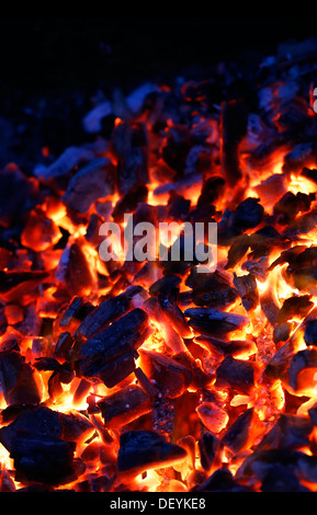 burning charcoal background with fire and sparks Stock Photo - Alamy