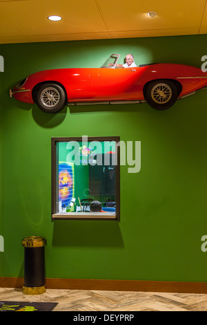 Jimmy Buffett character in sports car over valet window at Jimmy ...