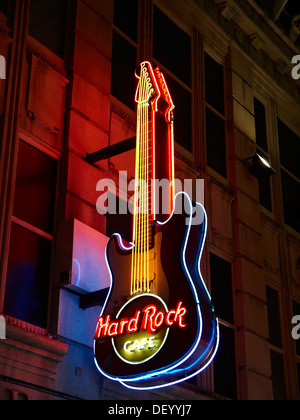 Hard Rock Cafe logo illuminated in red light. British American ...