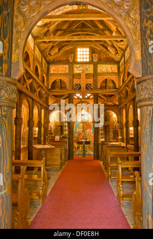 Stave church interior with pews and an altar, Roedven, Gemeinde Rauma ...