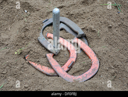 Peg with horseshoes (Horseshoe throwing game) Gun’s Camp, Hollyford ...