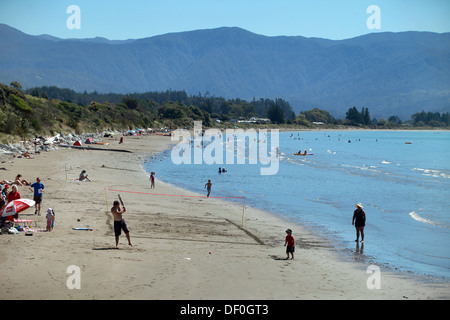 People enjoying the sunshine at Pohara beach, Golden Bay, Nelson, New ...