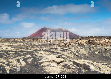 Pahoehoe or ropy lava in foreground, with aa lava middle and the ...