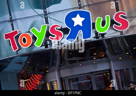 A logo sign outside of a Toys "R" Us retail store in Altoona ...