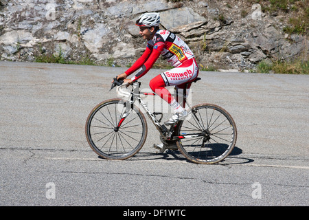 cyclist riding determined rock face pedaling pedal Stock Photo - Alamy