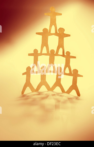 Human team pyramid. Team building Stock Photo - Alamy
