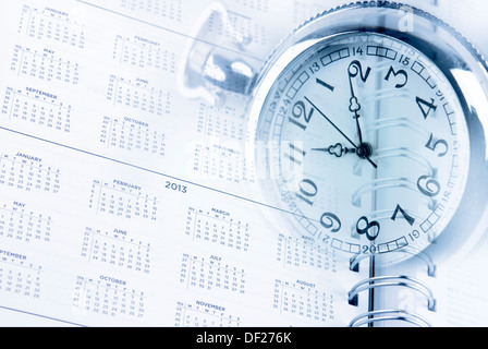 Clock and diary page dates Stock Photo - Alamy