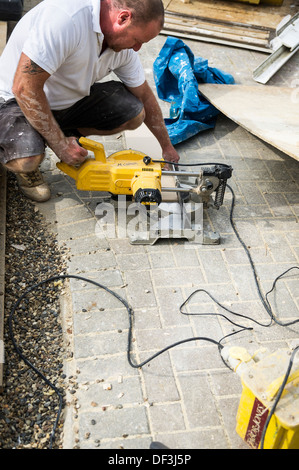 worker working with power tool in carpentry workshop Stock Photo - Alamy