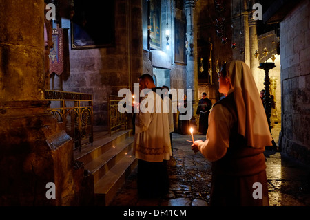 A Franciscan friar praying in Chapel of Mary Magdalene inside the Stock ...